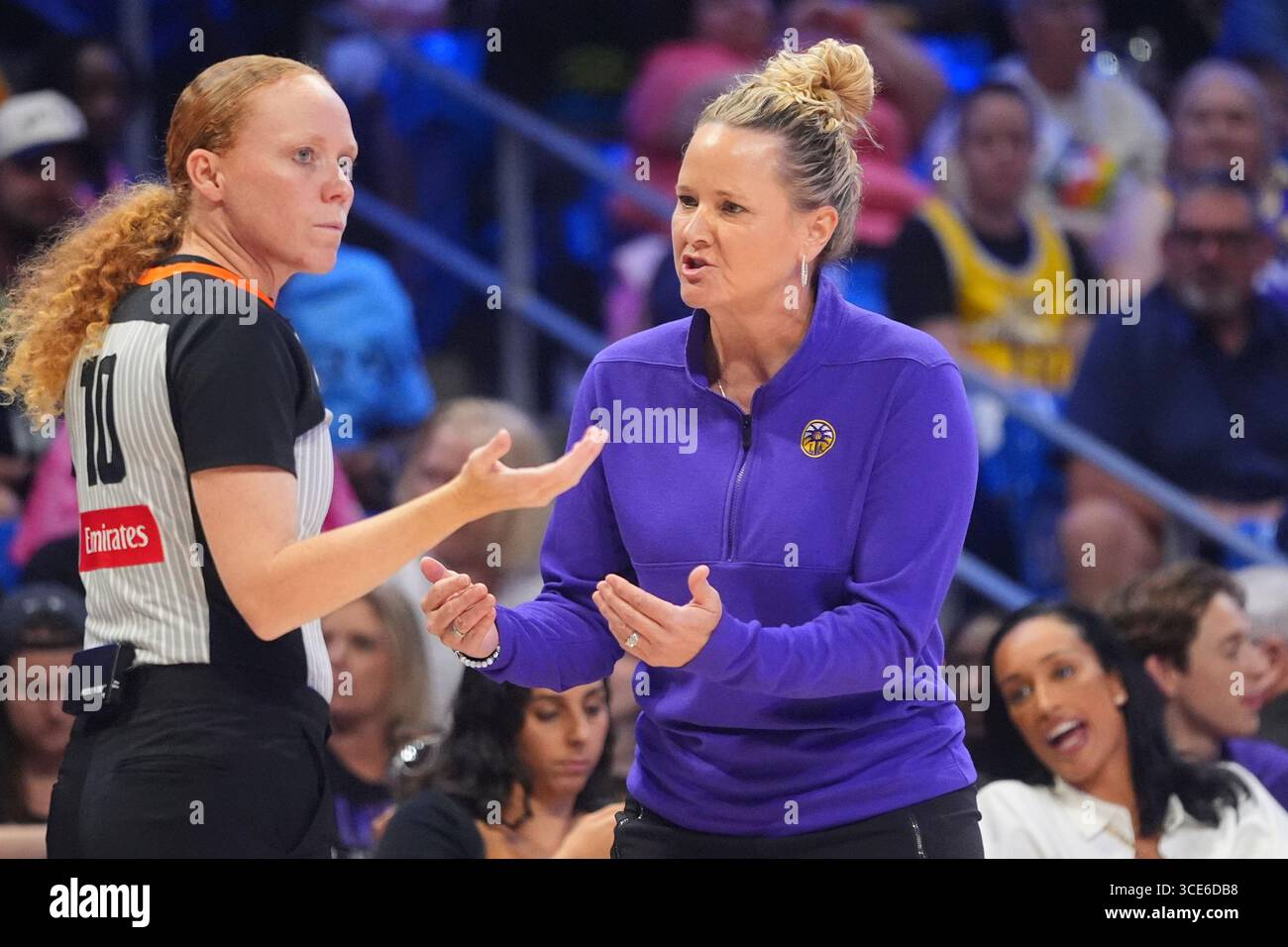 Los Angeles Sparks head coach Lynne Roberts, right, questions a call ...