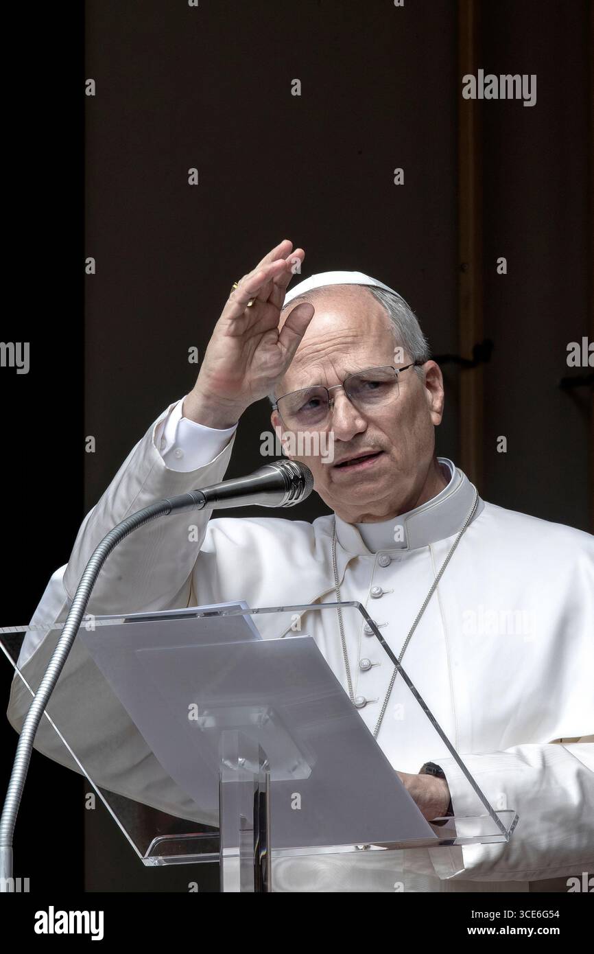 Pope Leo XIV gives his blessing during his Angelus prayer from the ...