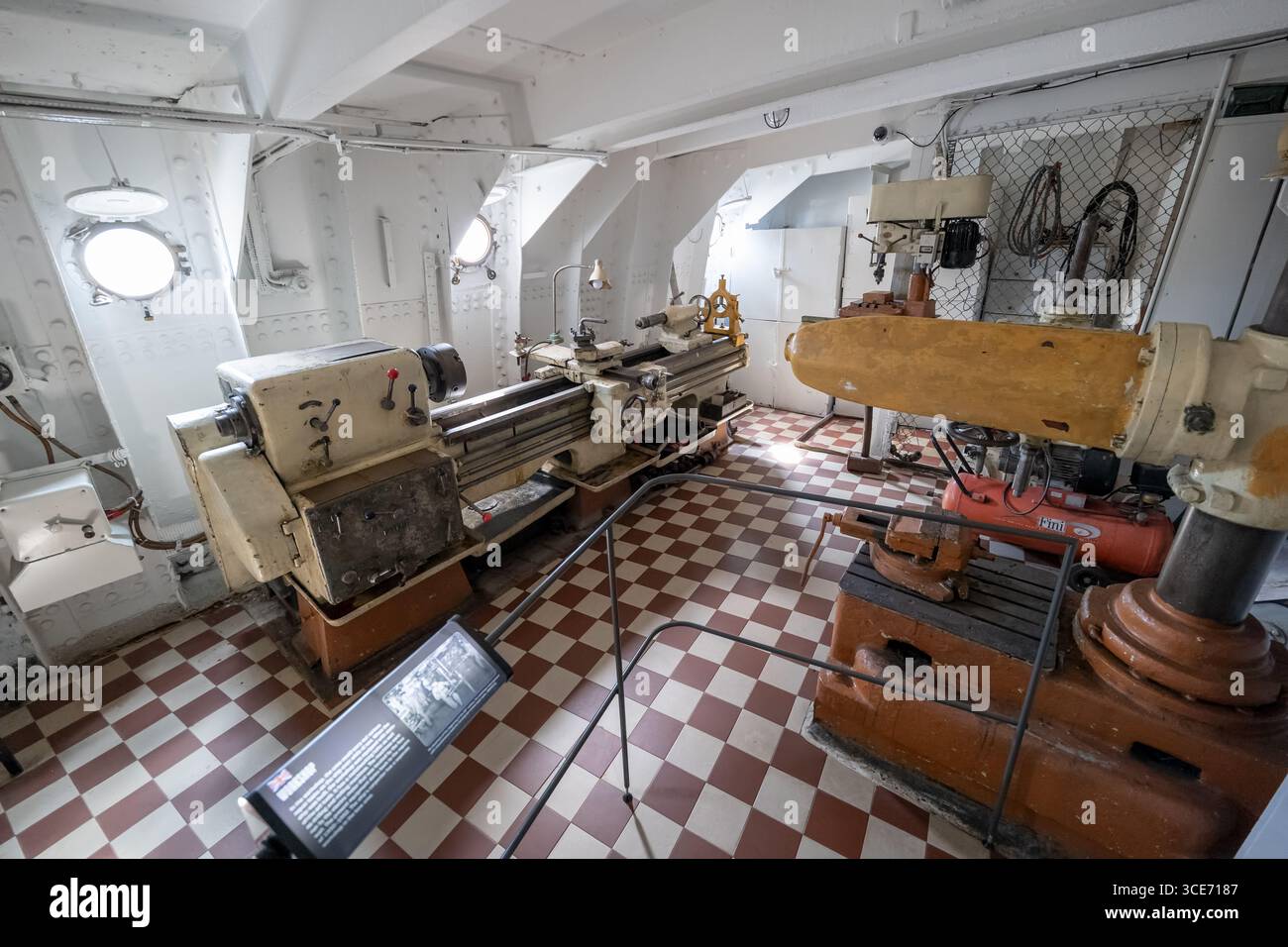 Workshop with metalworking lathe and drilling and milling machines in ...