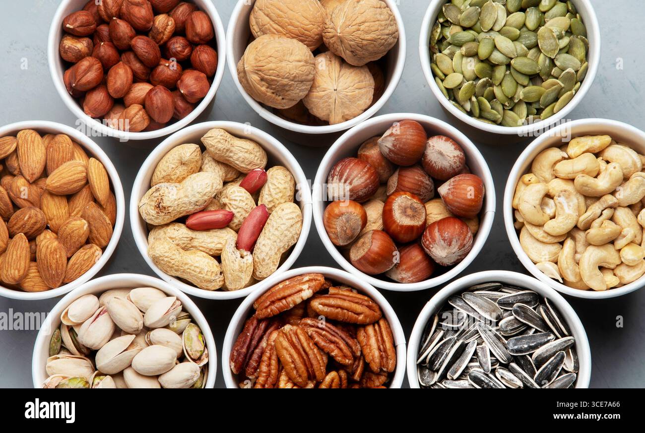 Different types of Nuts in ecofriendly cups high in vegan protein ...