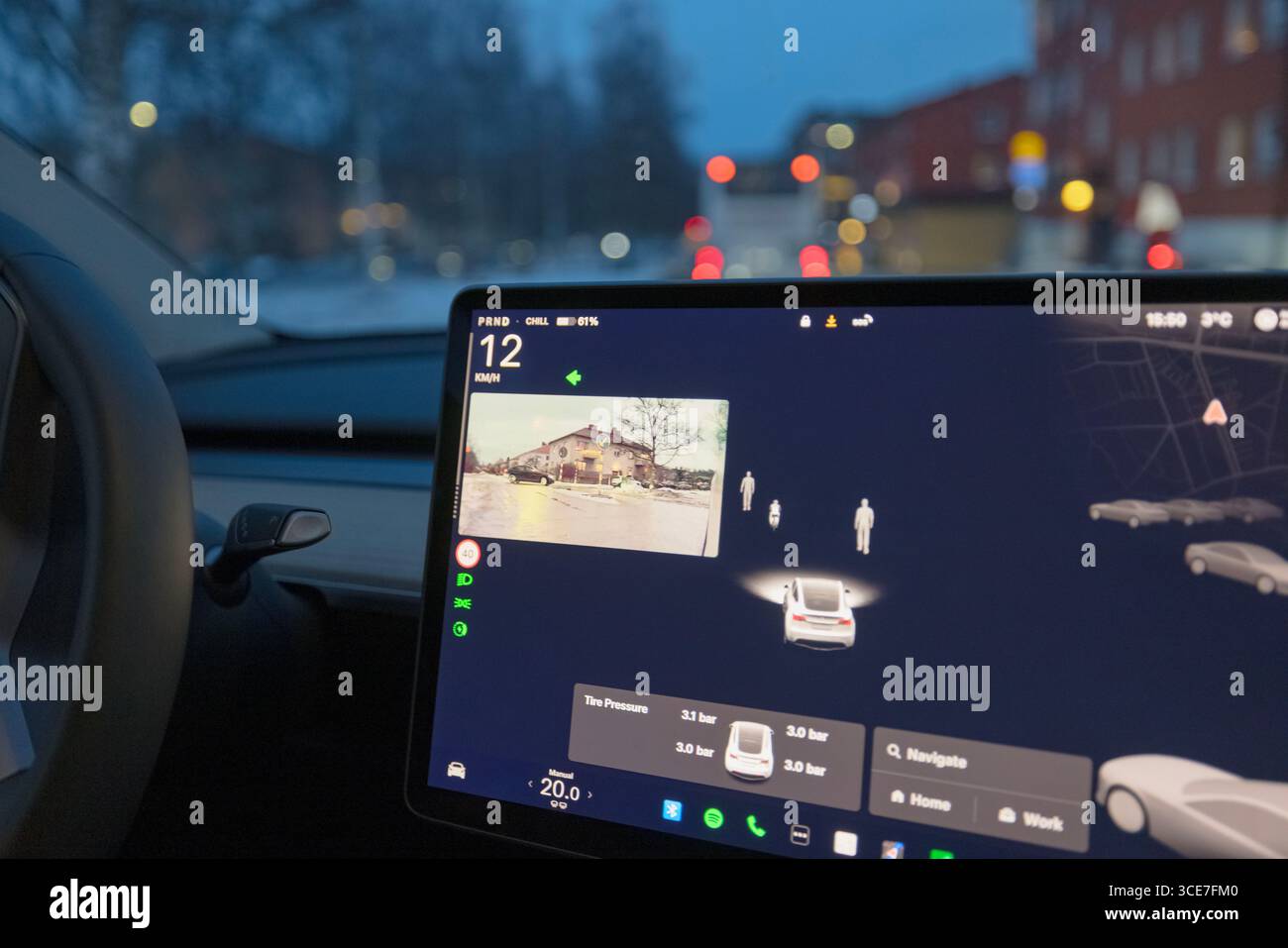 Tesla Model Y electric car interior with central touchscreen showing ...