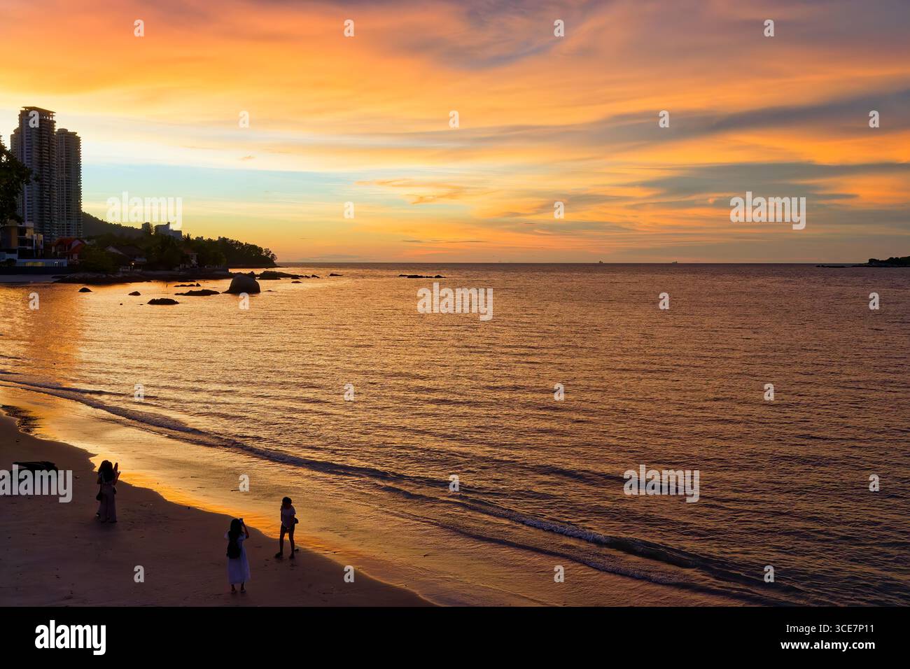 Penang skyline and beach on the Malacca Straits at sunset, Penang ...