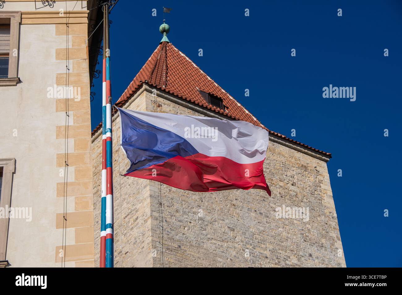 Flag of the Czech Republic flies in front of the gate of Prague Castle ...