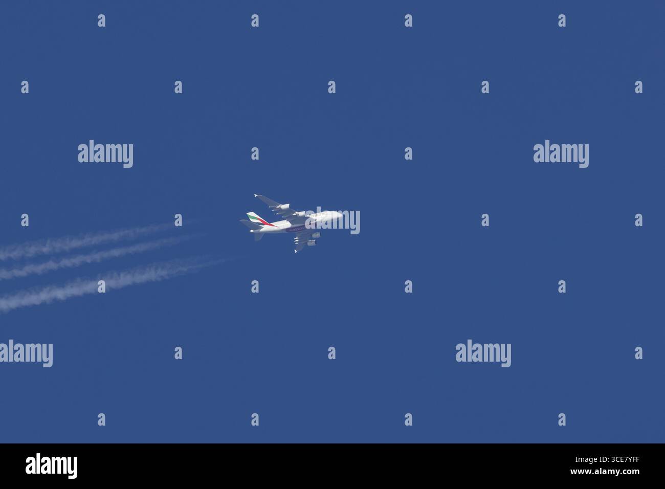 Airbus A380 jet passenger aircraft of Emirates airlines in flight in a ...