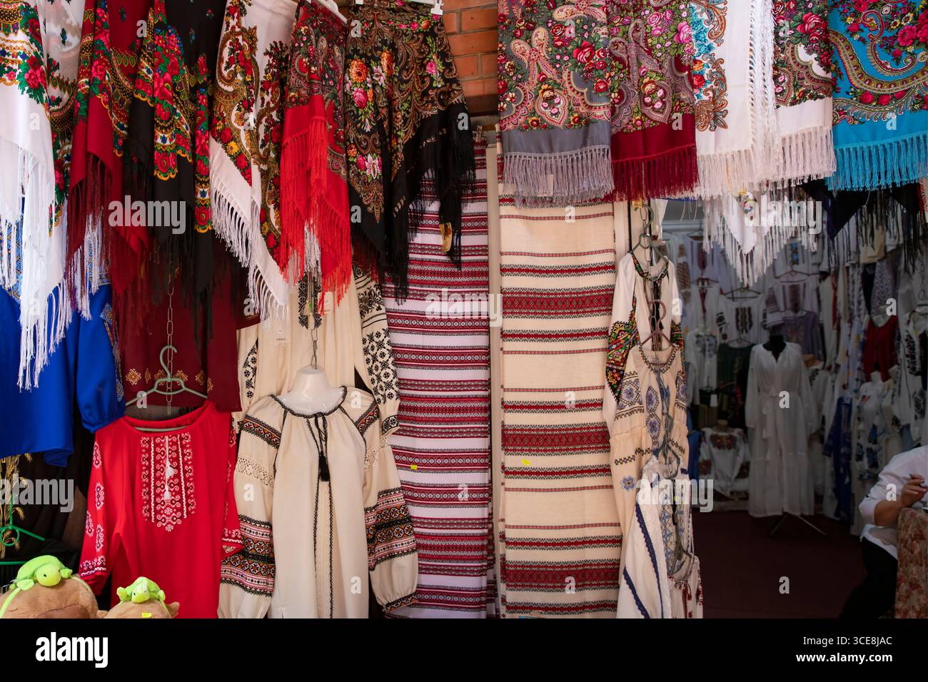 Editorial use only Traditional embroidered blouses shawls and textiles ...