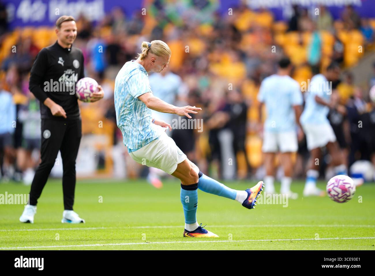 Manchester City assistant manager Pepijn Lijnders (left) watches on as ...