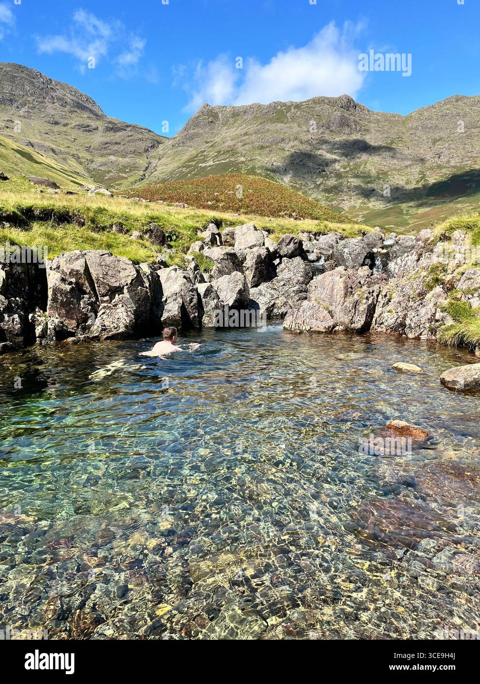 Man swimming river smartphone stock photos and images - Alamy