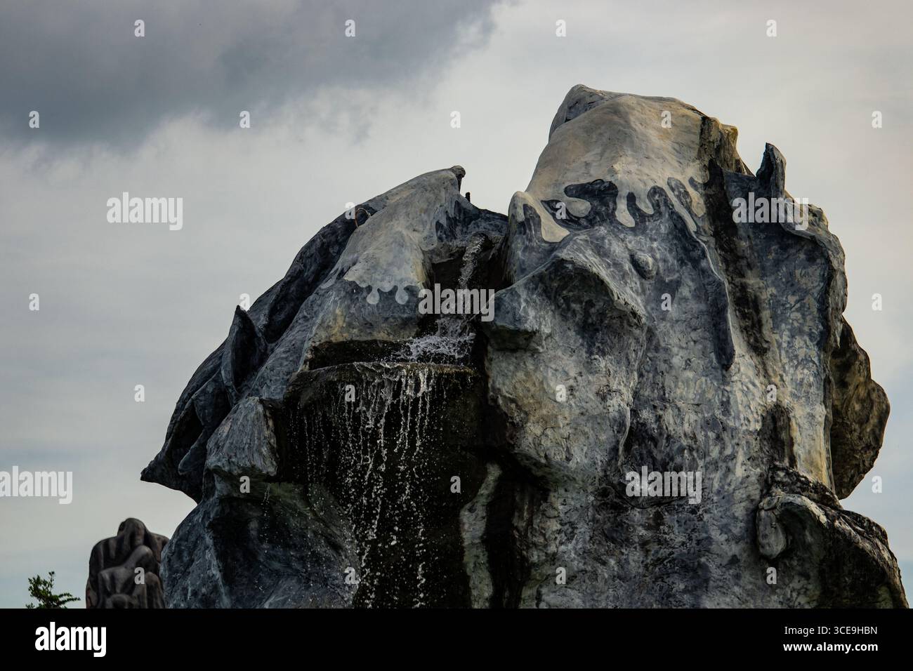Waterfall Fountain with Decorative Fake Rocks Stock Photo - Alamy