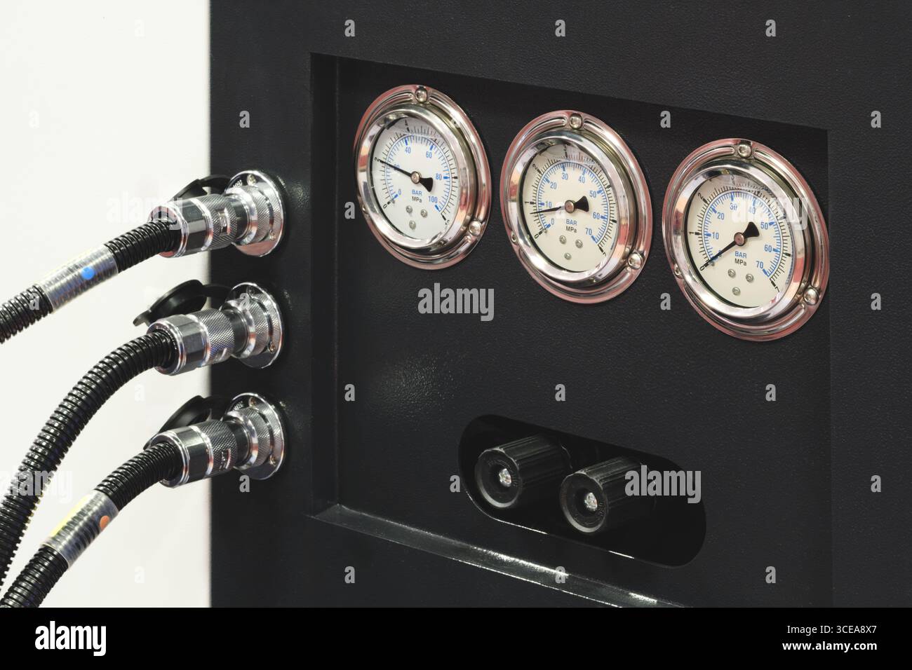 Three high pressure manometers on the industrial machine panel control ...