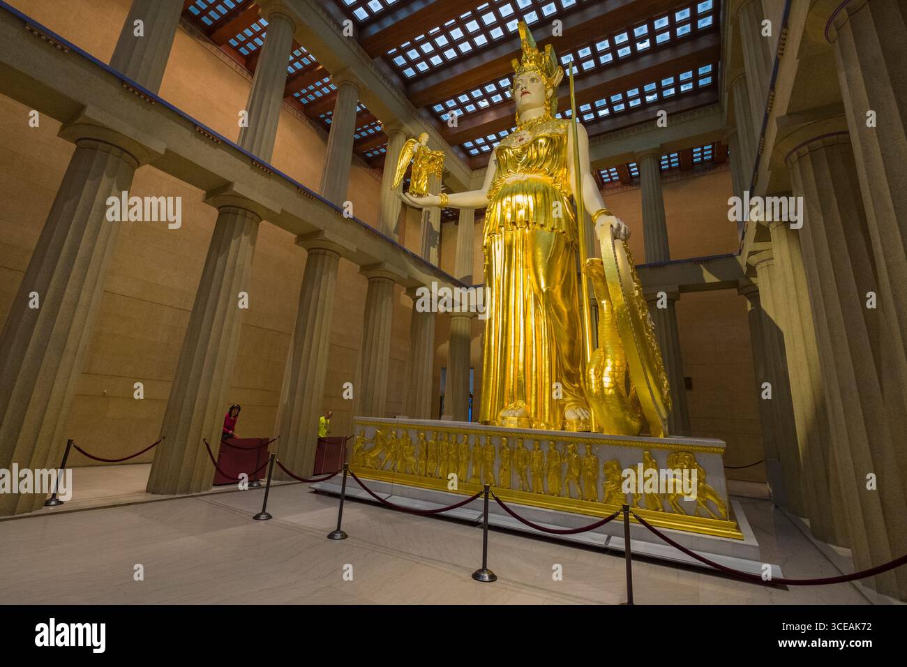 The 42 feet tall statue of Athena Parthenos holding a 6 foot statue of ...