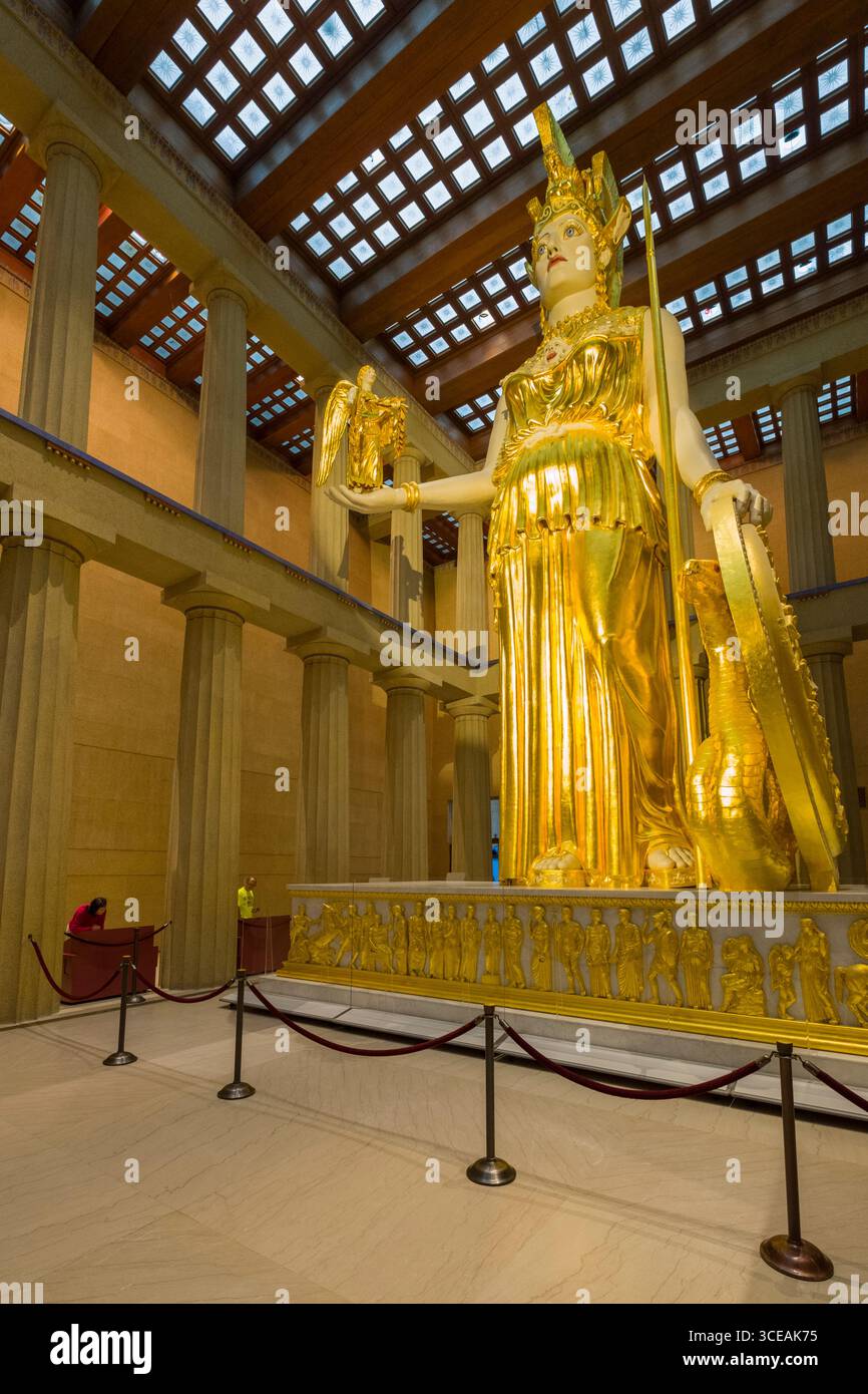 The 42 feet tall statue of Athena Parthenos holding a 6 foot statue of ...