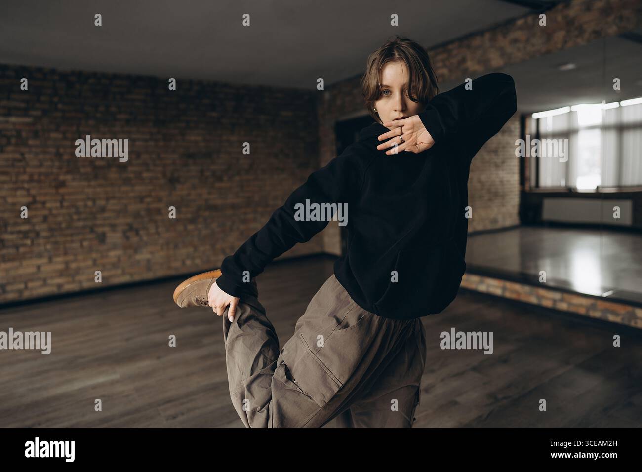 Dynamic dance rehearsal in modern studio setting with expressive ...