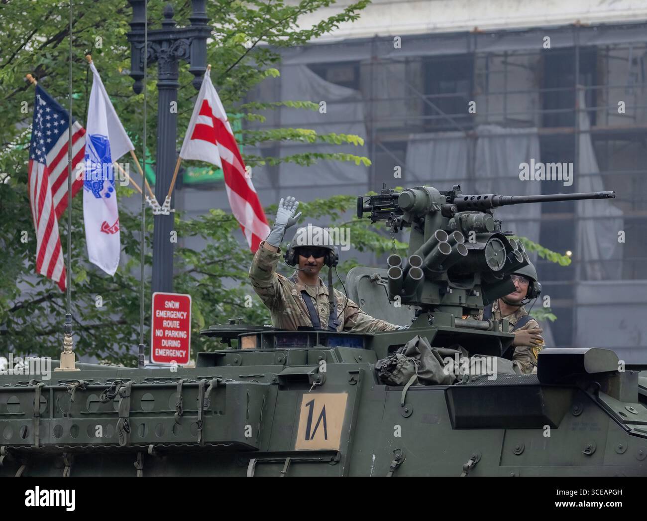 WASHINGTON, D.C. – June 14, 2025: Soldiers ride in a military vehicle ...