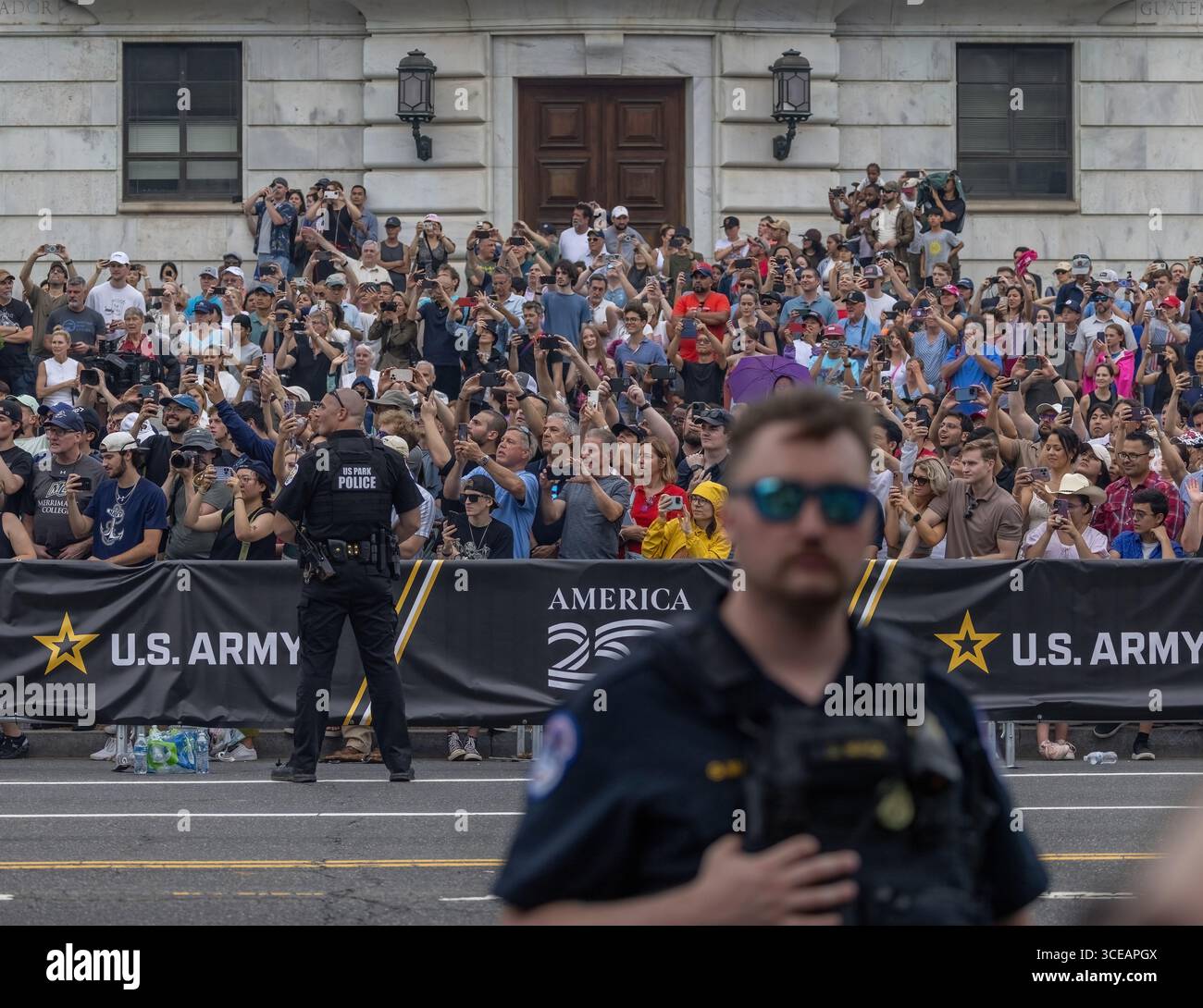 WASHINGTON, D.C. – June 14, 2025: Police officers and spectators are ...