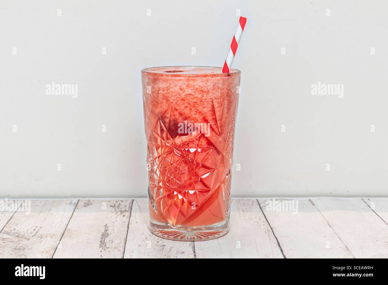 Liquid Sunset: A glass of pink lemonade freezing the moment, reflecting ...