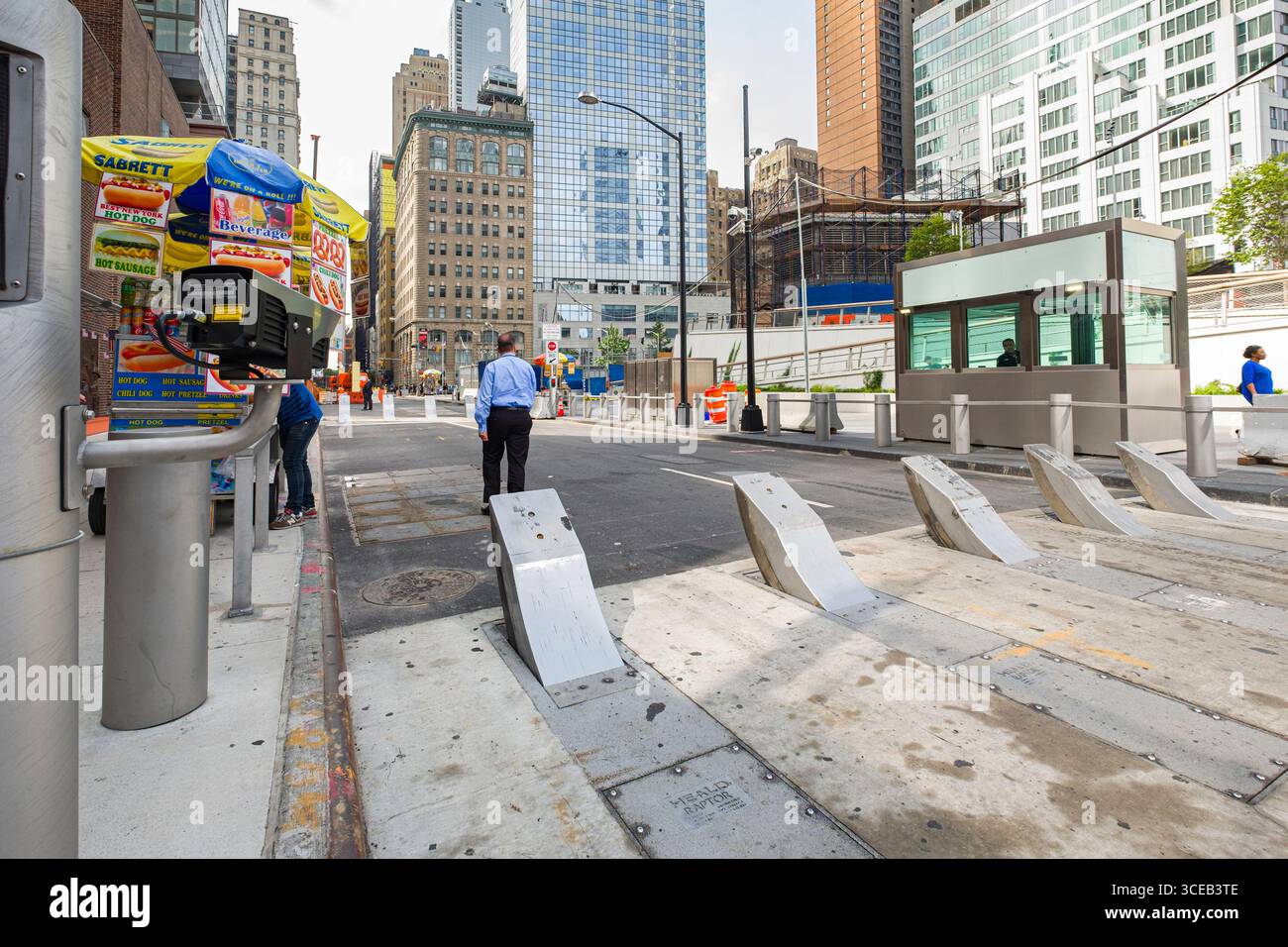 High security barriers that lower into the roadway to allow access on ...