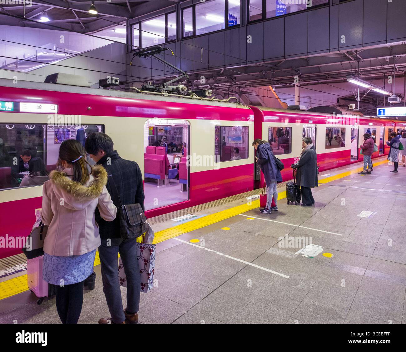 Passengers standing on train platform 1 in Ebisu Station, Shibuya ...