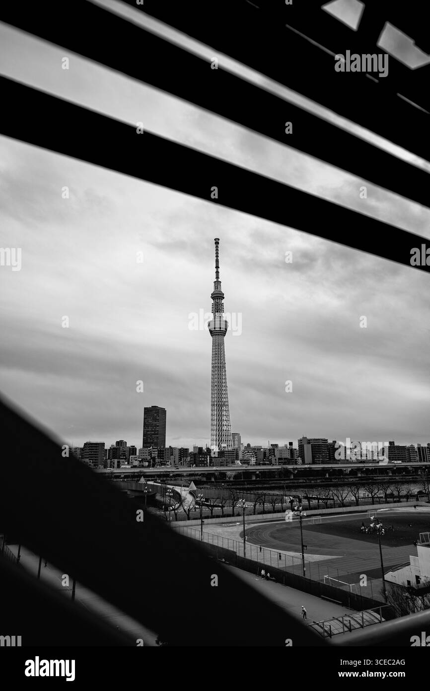 Tokyo Skytree viewed through the gaps of an old iron tower structure ...