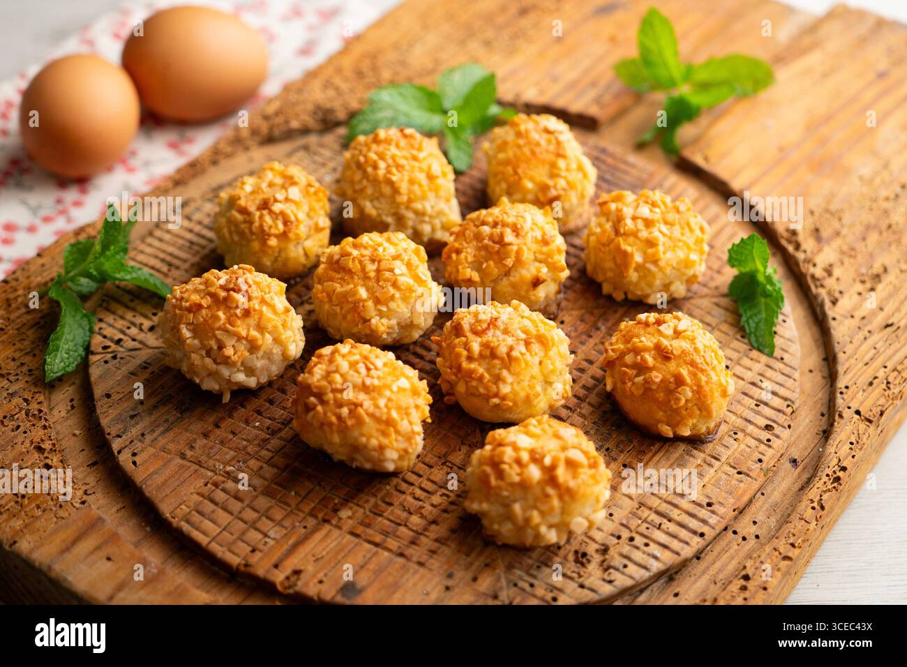 Panellets with pine nuts and almonds. A typical Catalan dessert made ...