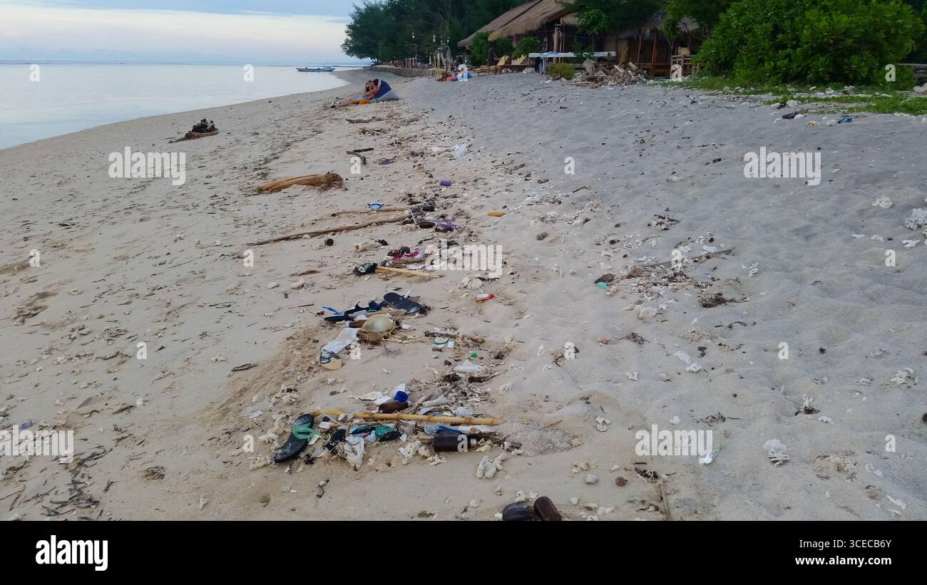a lot of garbage on the sandy sea beach Stock Photo - Alamy