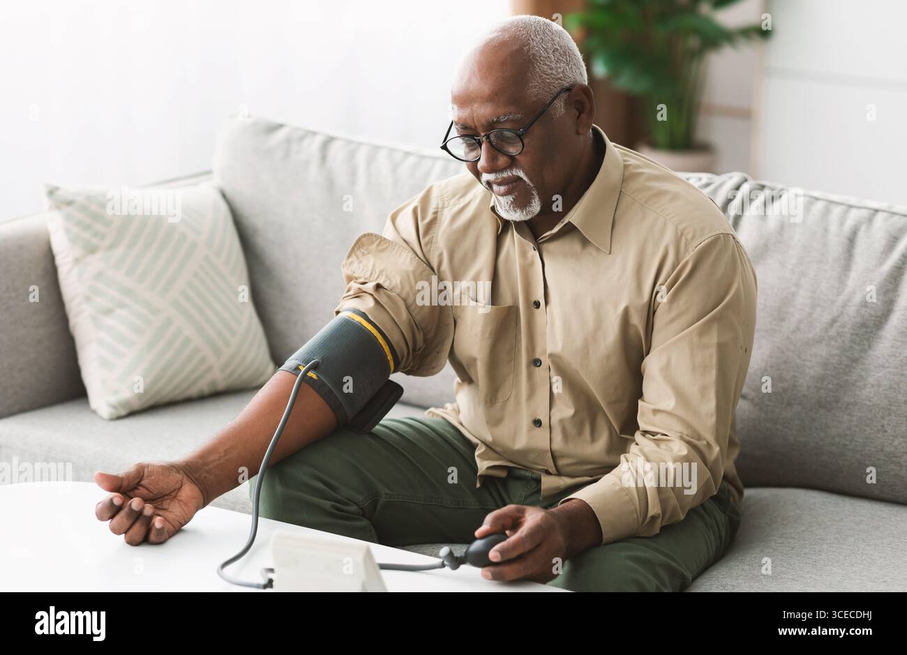 Mature man having hypertension hi-res stock photography and images - Alamy
