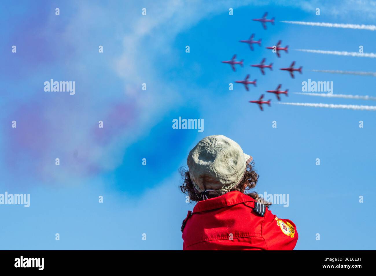 Child wearing red arrows flying suit hi-res stock photography and ...