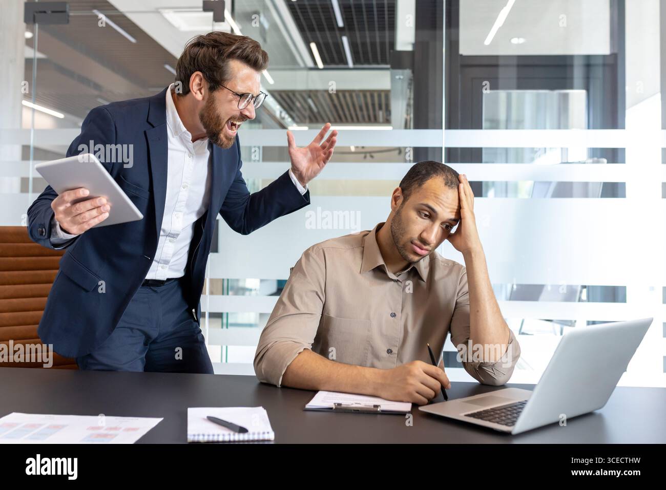 Office environment depicting conflict hi-res stock photography and ...
