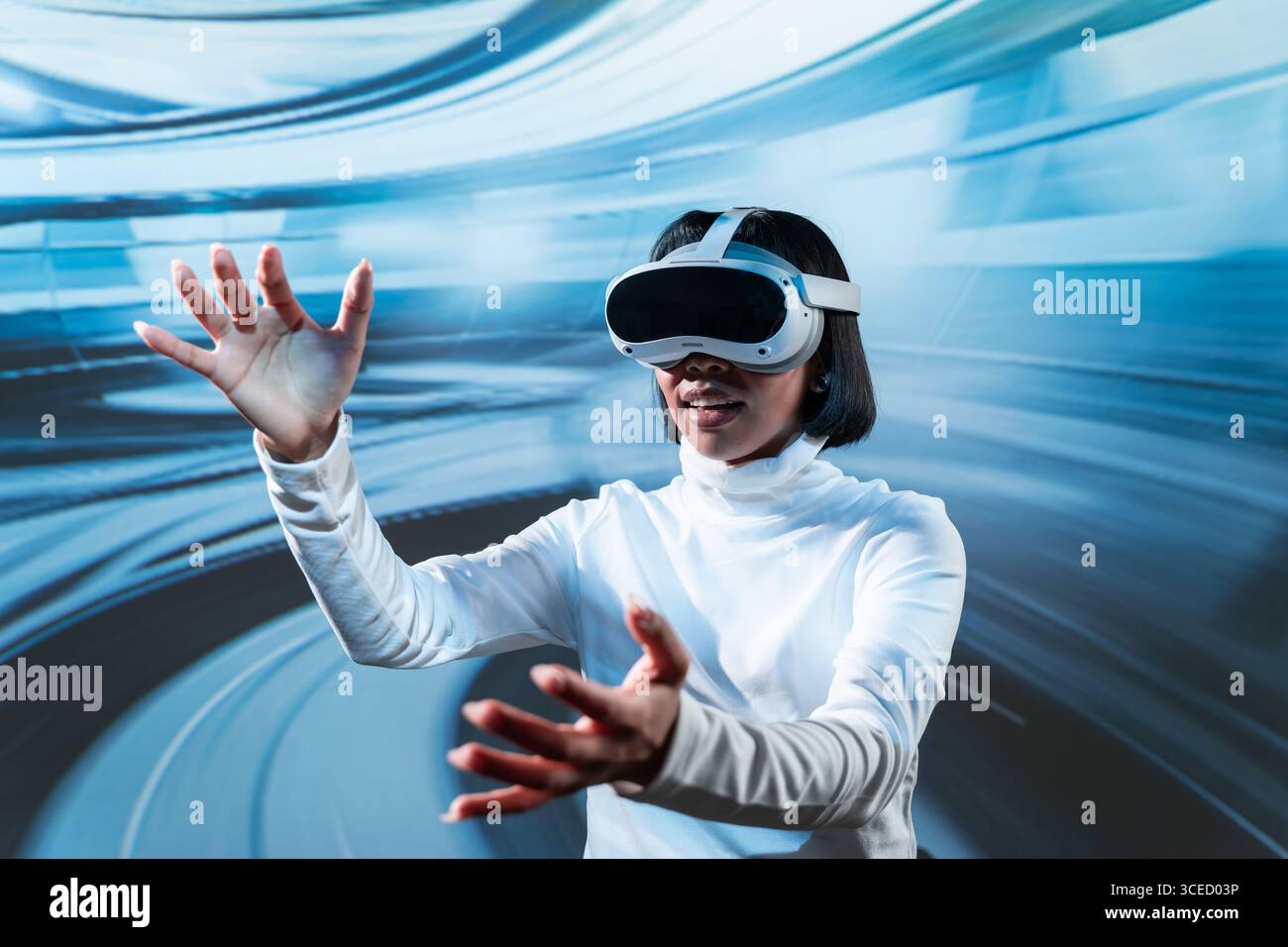 Woman immersed in engaging virtual hi-res stock photography and images ...