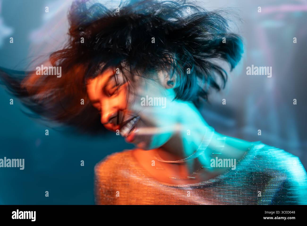 A futuristic Latin woman enjoys a vibrant dance in the metaverse ...
