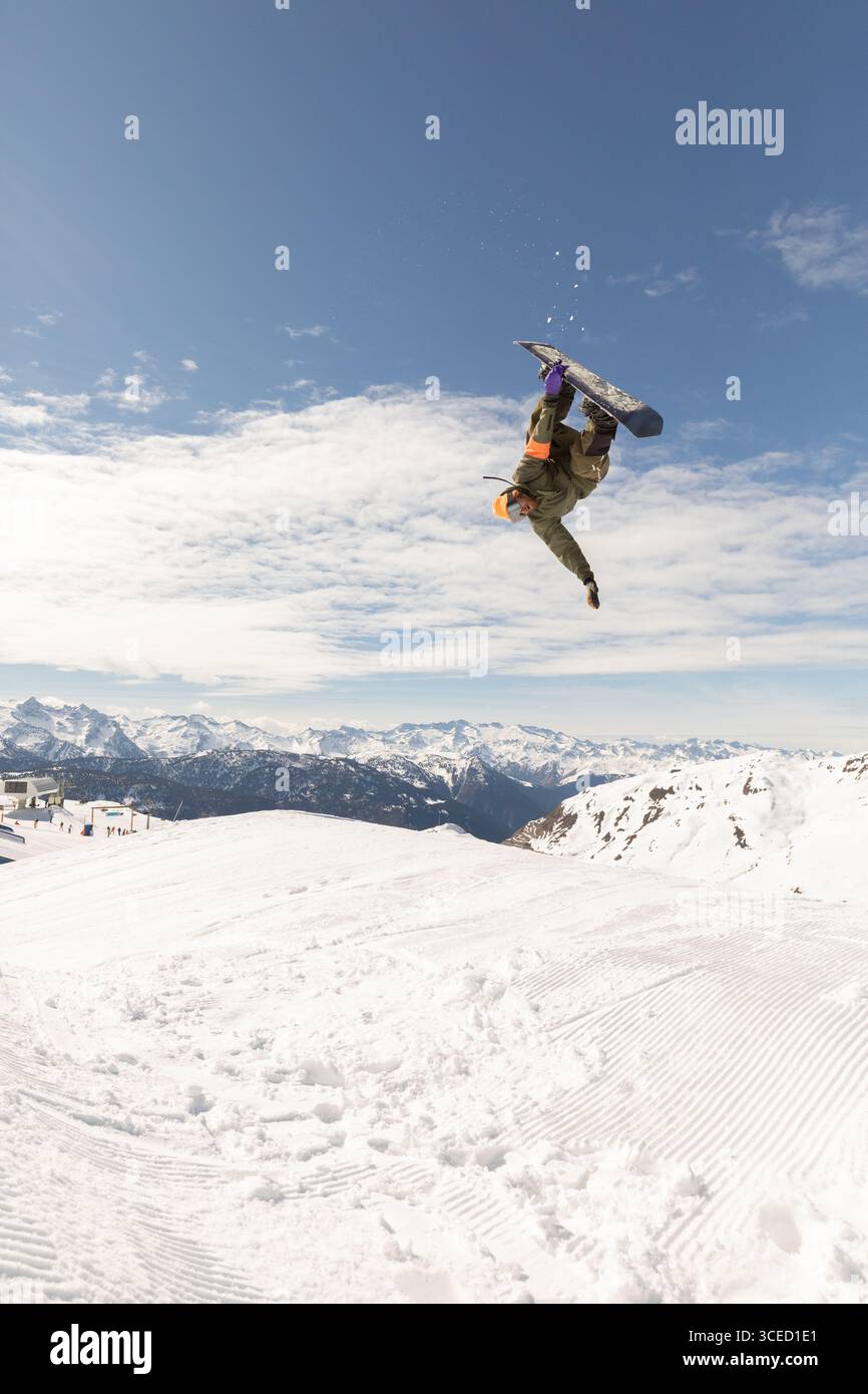 Snowboarder performing trick snow hi-res stock photography and images ...