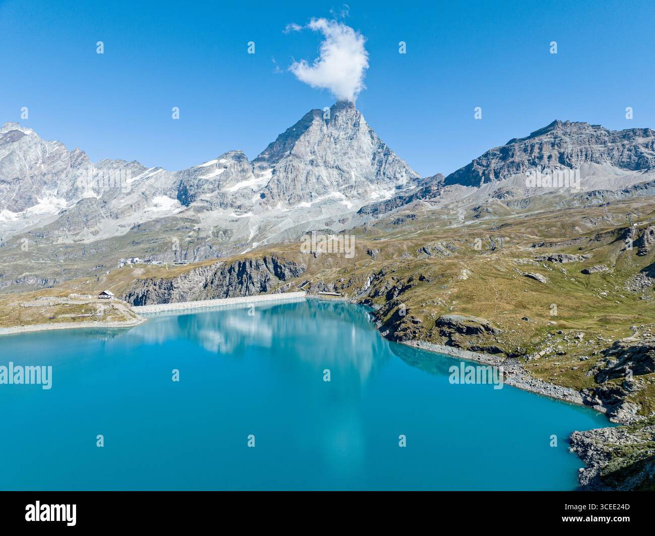 Aerial view of the Matterhorn, seen from Breuil-Cervinia. Green valleys ...