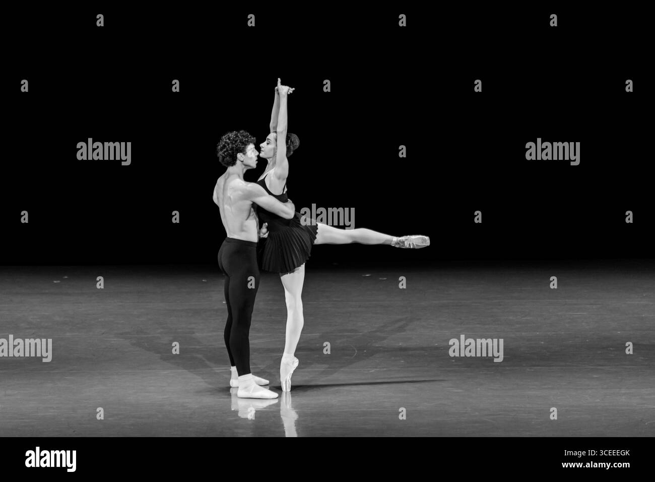 Legs woman man in black Black and White Stock Photos & Images - Alamy