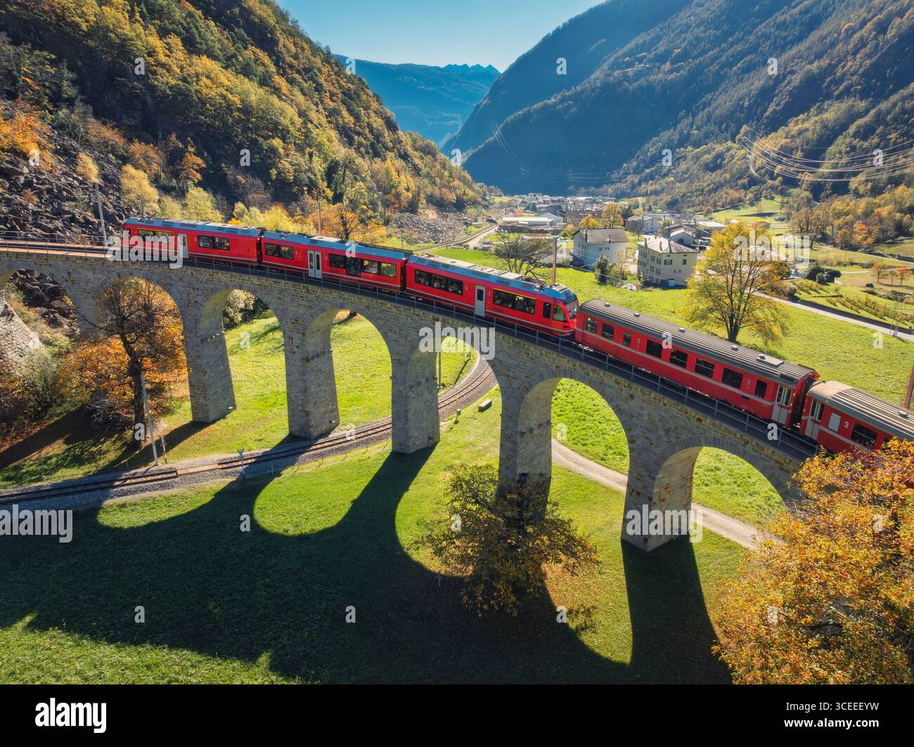 Aerial view of the red Bernina Express train on Brusio Viaduct Stock ...