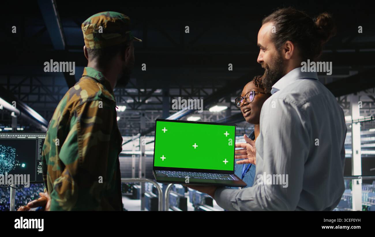 Military command center engineering team using chroma key notebook ...