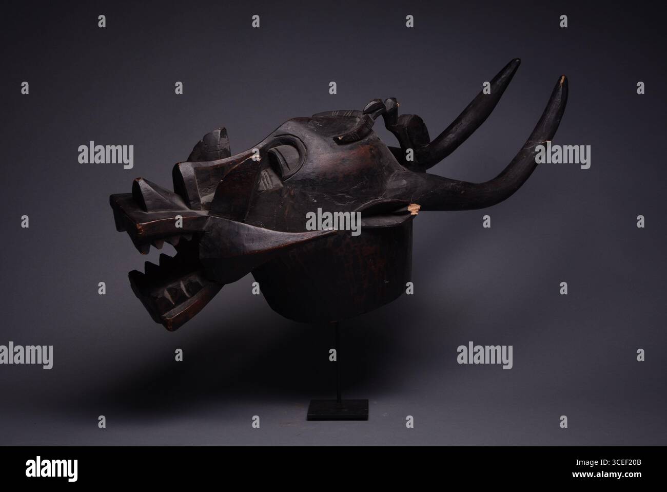 African Tribal Art: Senufo Wooden FIrespitter Mask Stock Photo - Alamy