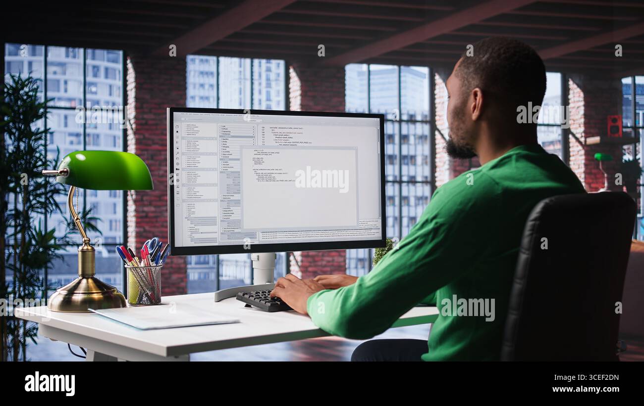 Technician writing code debugging hi-res stock photography and images ...