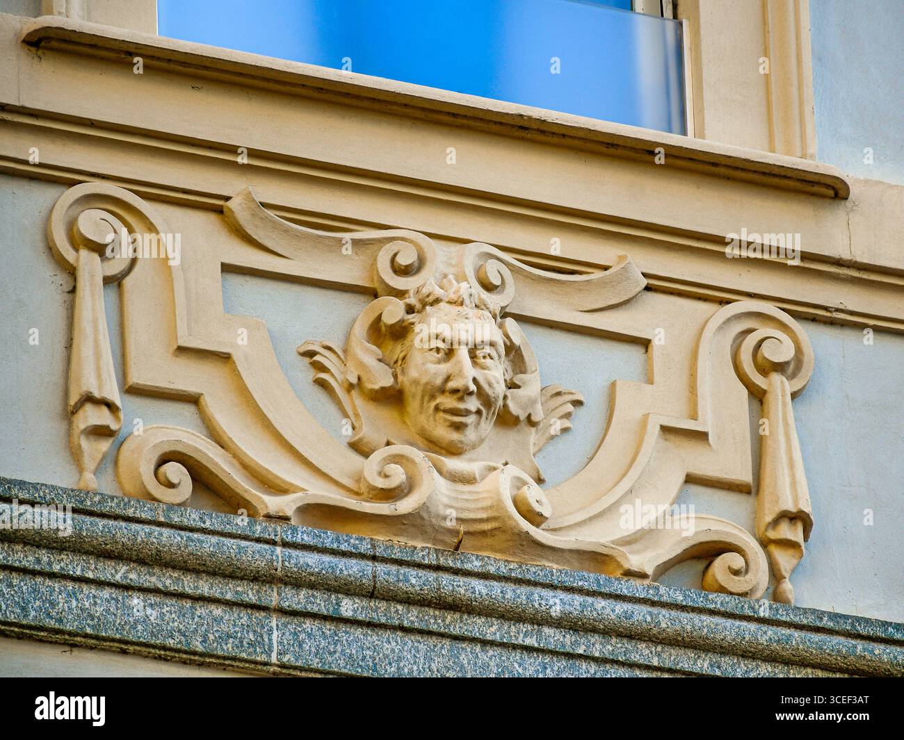 Stone Silence: A Watchful Mask of Turin Stock Photo - Alamy