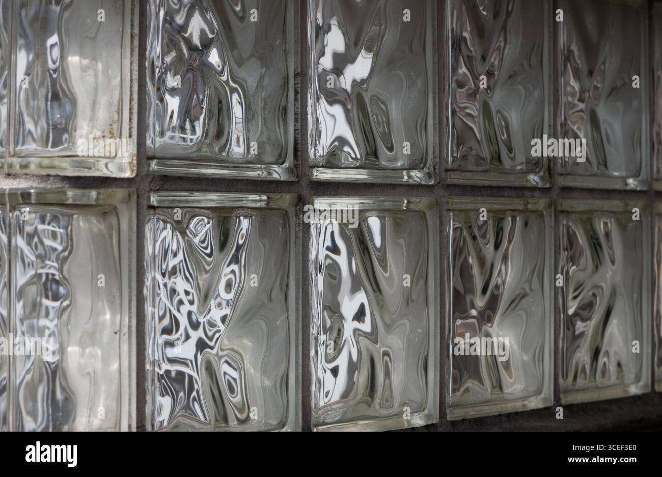 reflections in glass blocks making abstract designs and patterns from ...