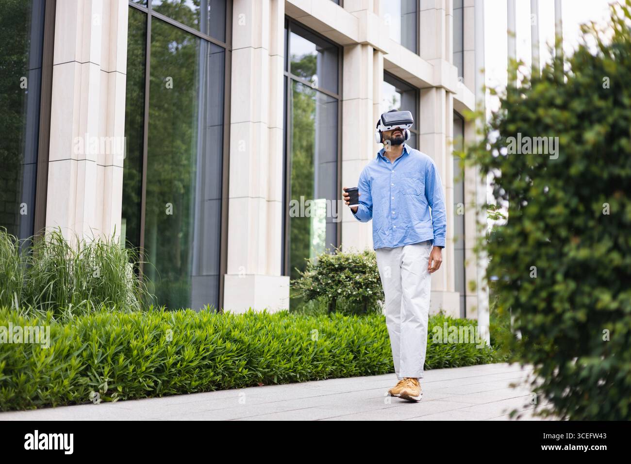 Businessman in vr glasses walking hi-res stock photography and images ...