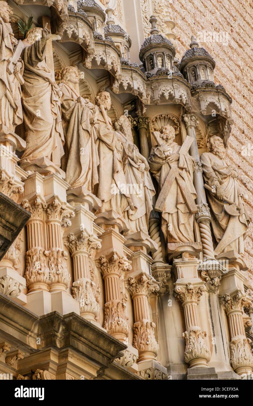Ornate Stone Sculptures At Montserrat Basilica Entrance With Religious ...