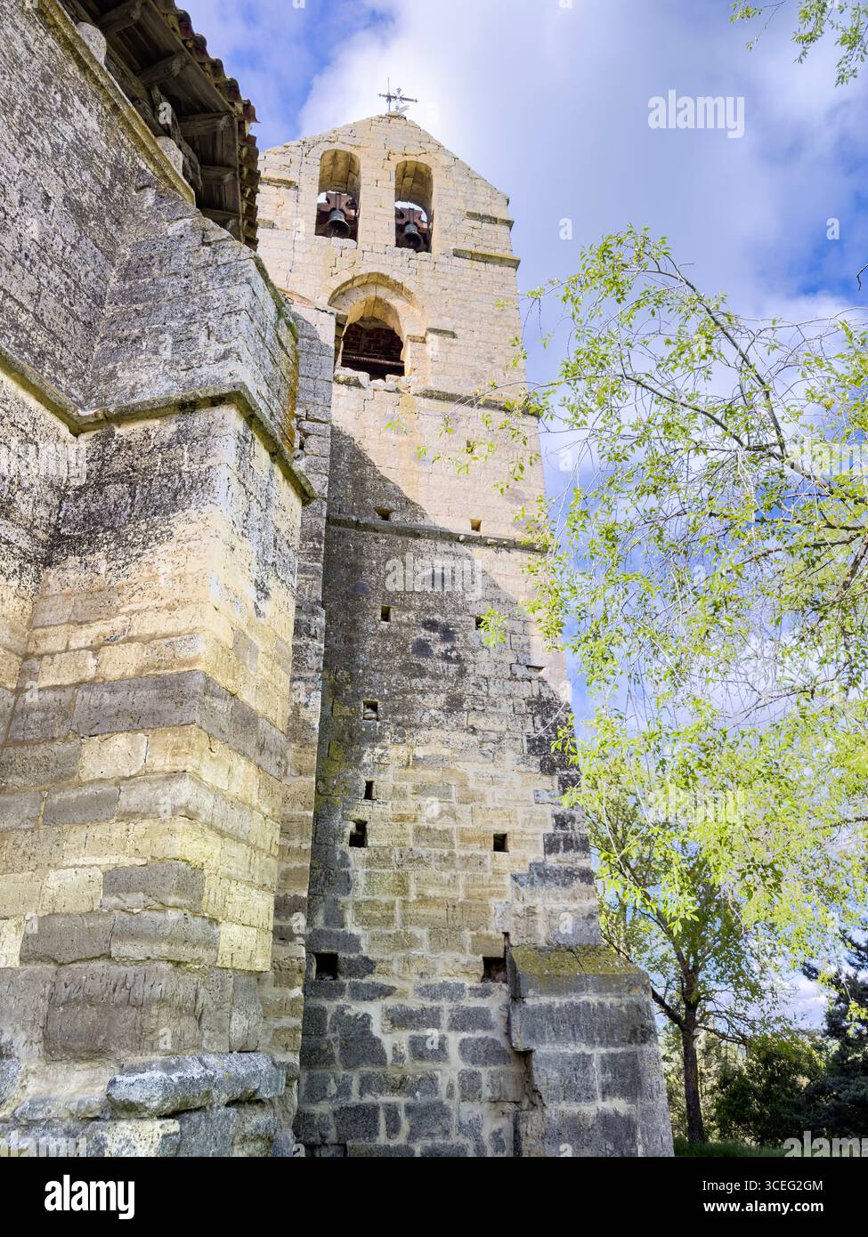 all stone bell gable with visible bells and support structures at the ...