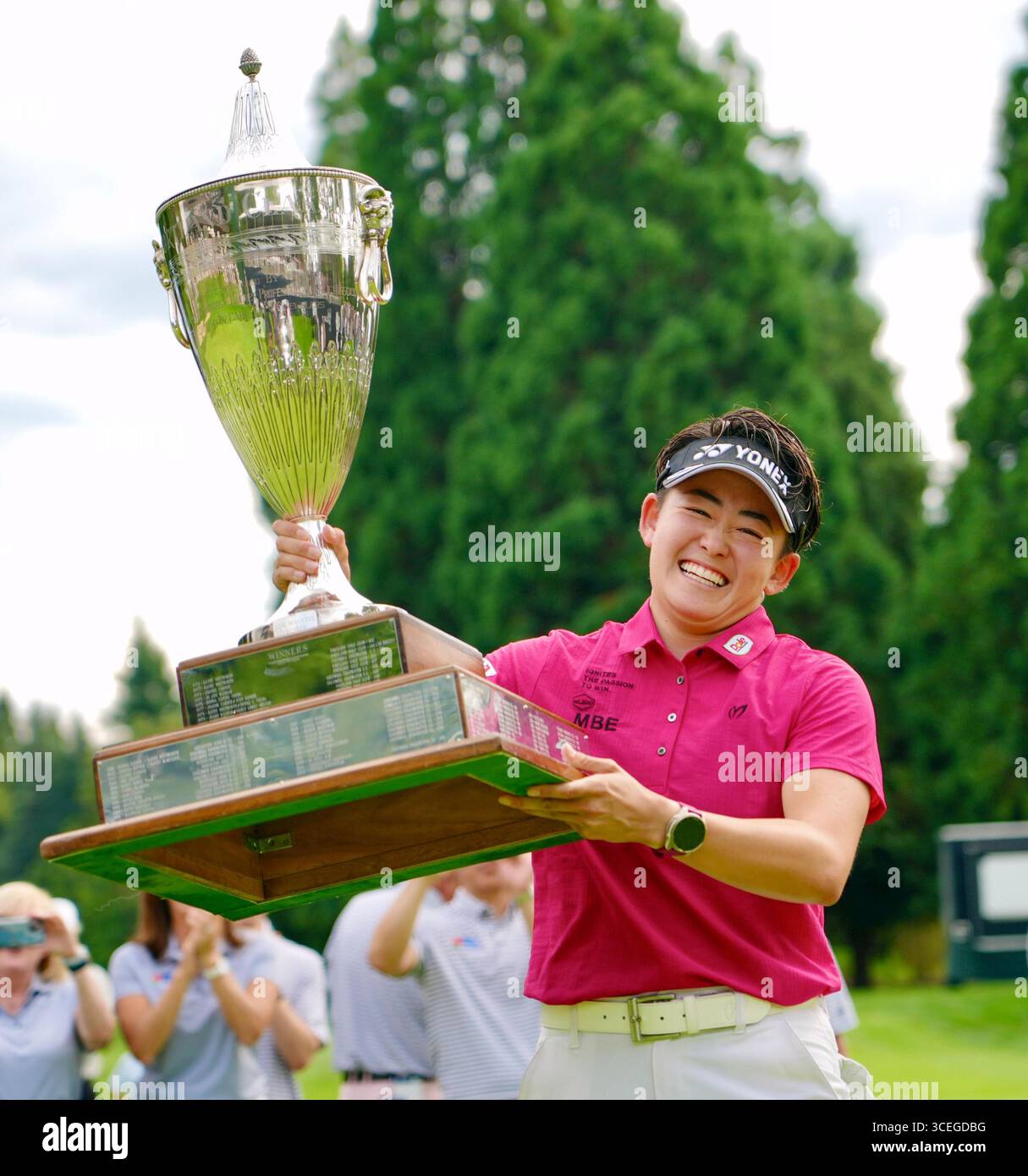 Akie Iwai of Japan poses for a photo with the trophy after winning the ...
