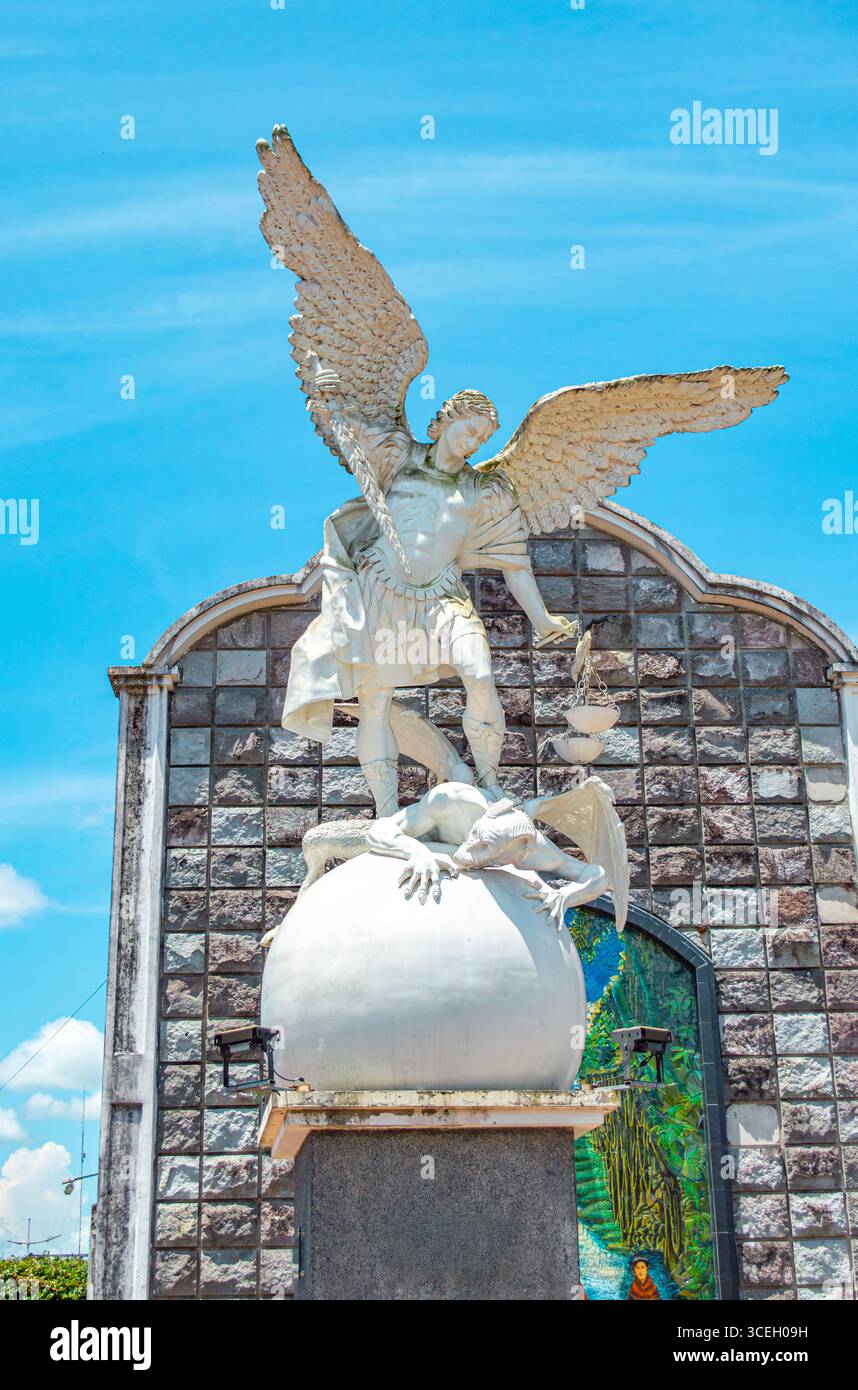A majestic angel statue symbolizing victory, set against a blue sky in ...