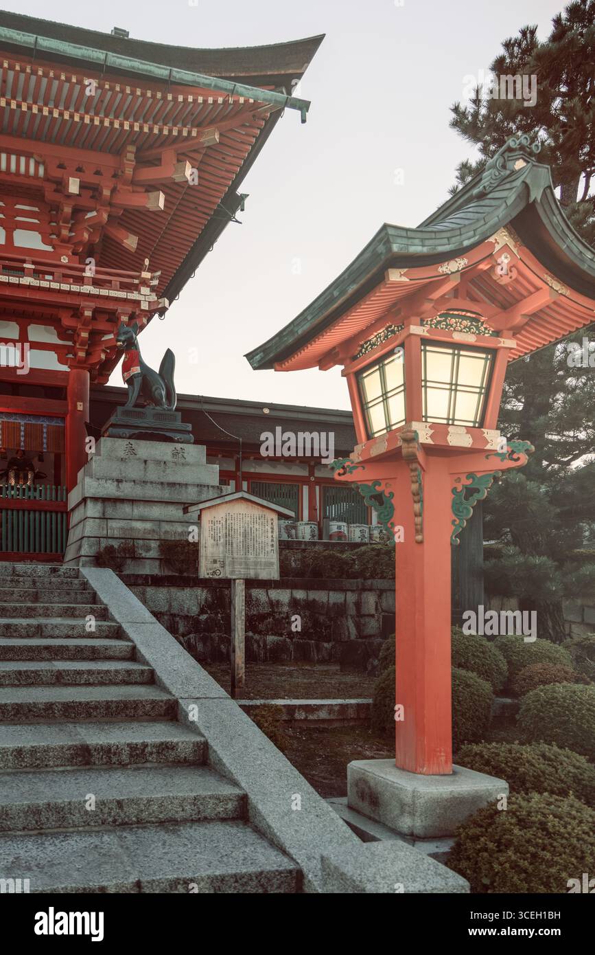 Traditional illuminated lantern near entrance of Fushimi Inari Taisha ...
