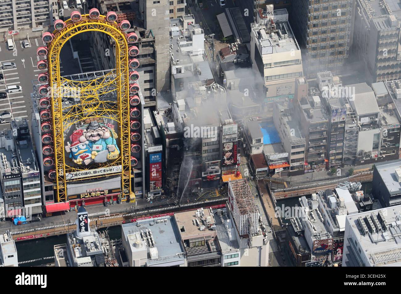[DATE CORRECTION]An aerial photo shows firefighters conduct an ...