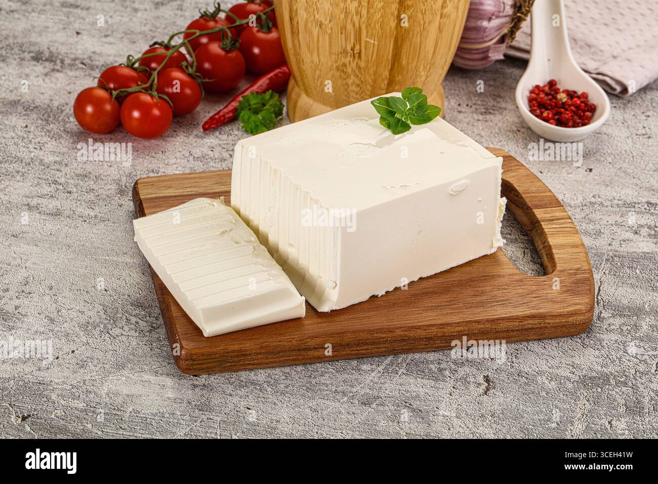 Soft Feta cheese piece with cut snack Stock Photo - Alamy