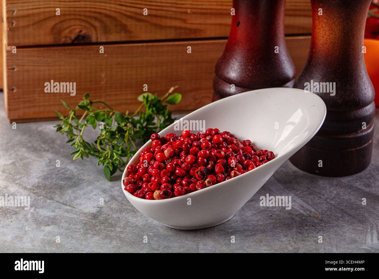 Dry pink pepper corn spice aroma seasoning Stock Photo - Alamy