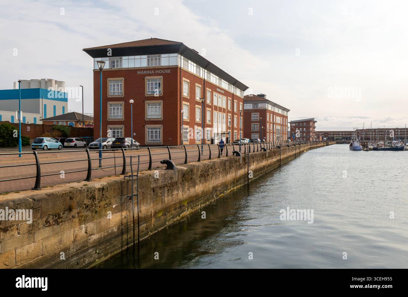 Marina House modern office and apartment building development on quays ...
