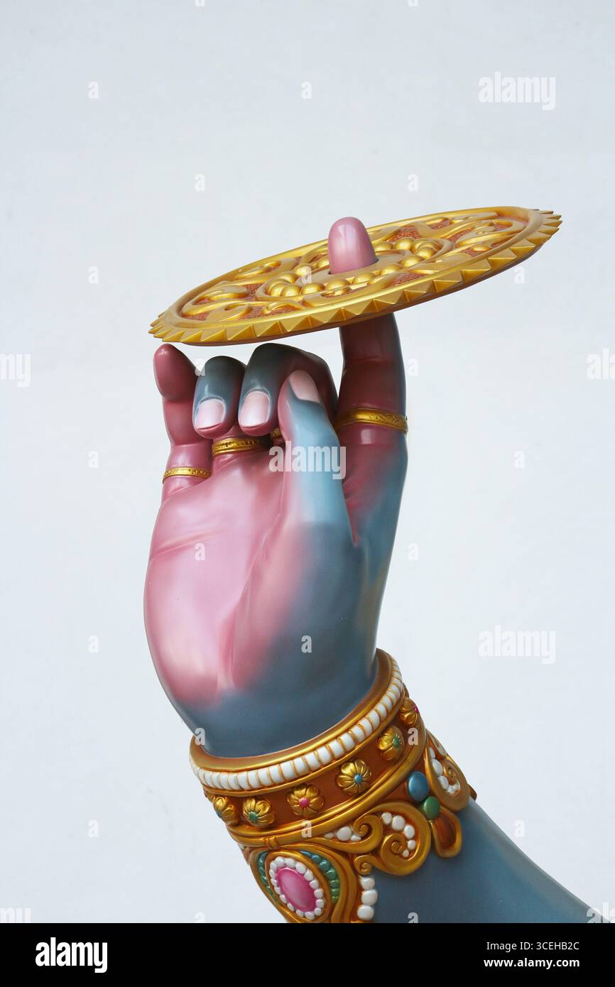 The legendary weapon of Vishnu is the Sudarshana Chakra on the finger ...