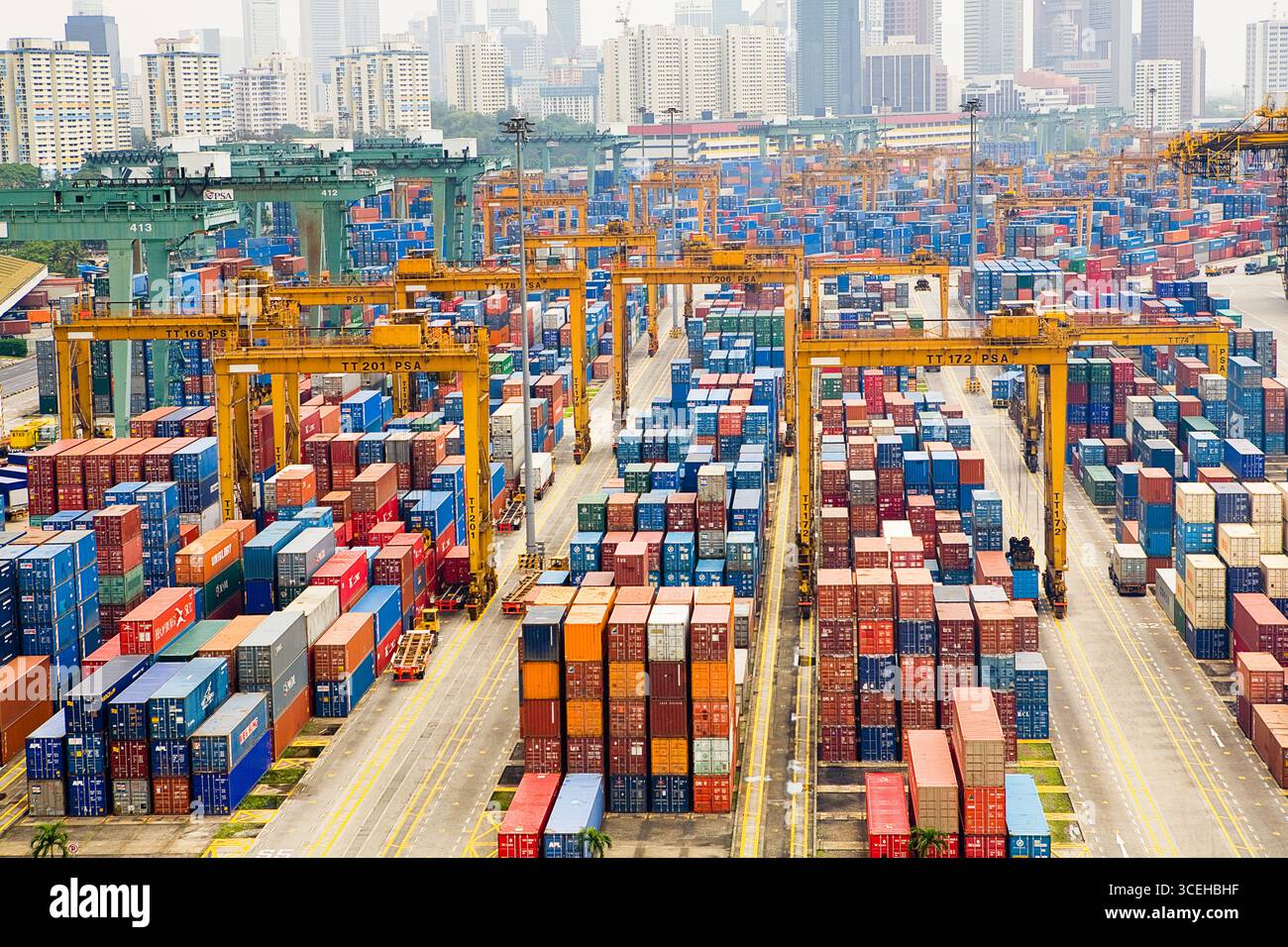 Containers stacked together at the Port of Singapore Authority (PSA) in ...